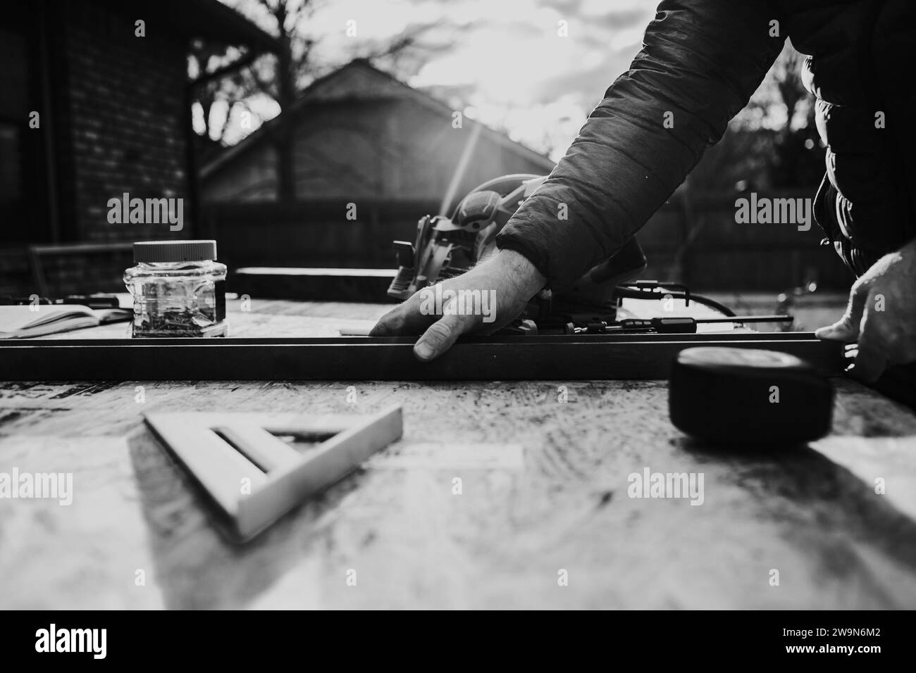 Hands holding measuring tools Black and White Stock Photos & Images - Alamy