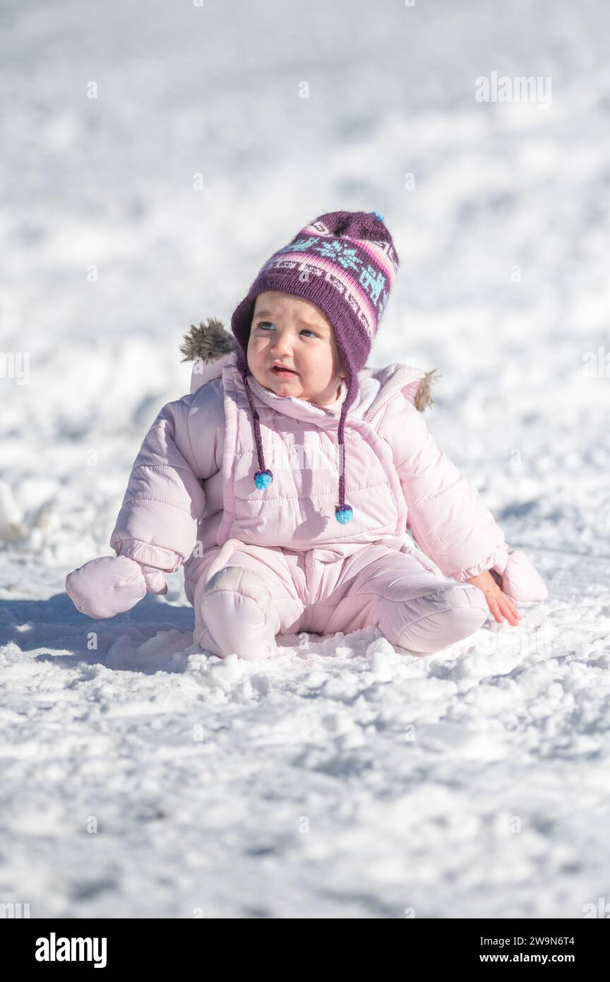 Portrait of baby in the snow in winter Stock Photo - Alamy