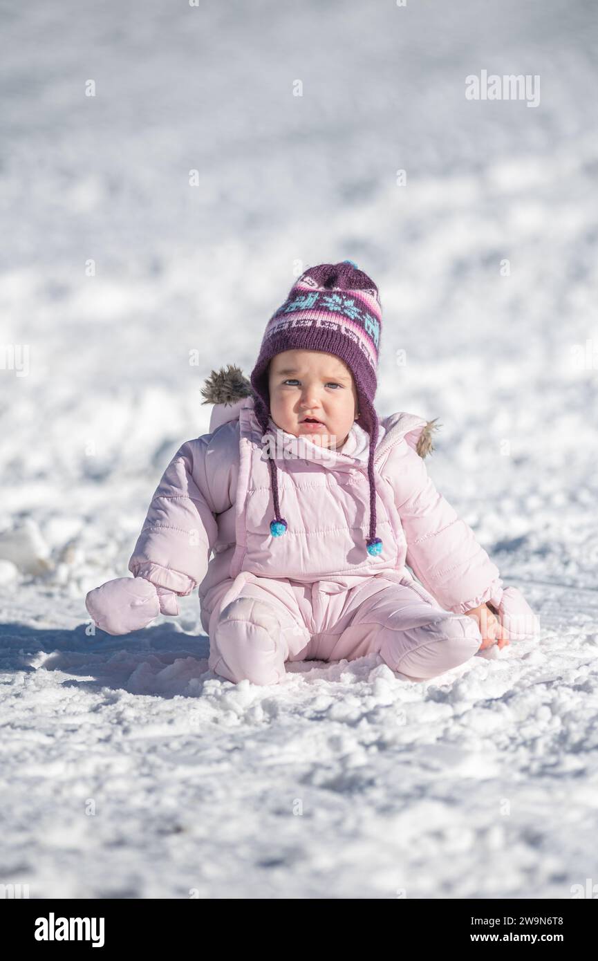 Portrait of baby in the snow in winter Stock Photo - Alamy
