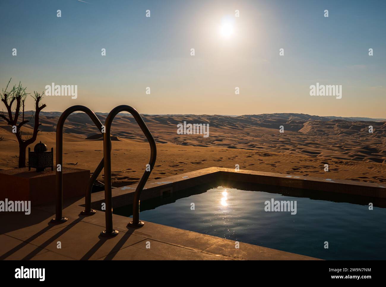 Bab al Nojoum bateen liwa resort pool and sun chairs overlooking the ...