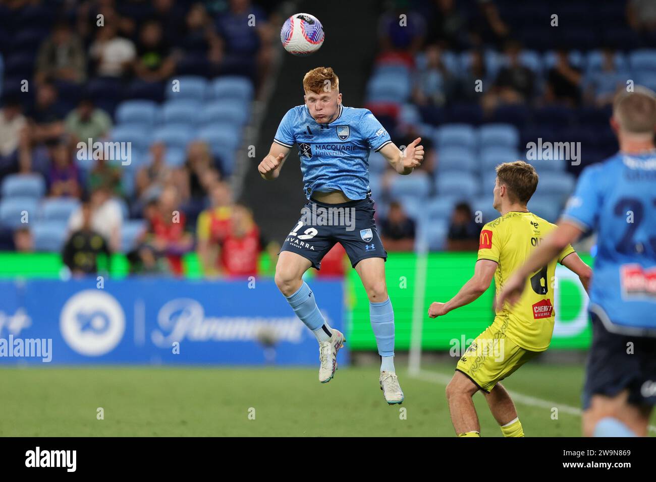 Sydney, Australia. 29th Dec, 2023. Mitchell Glasson of Sydney FC heads ...