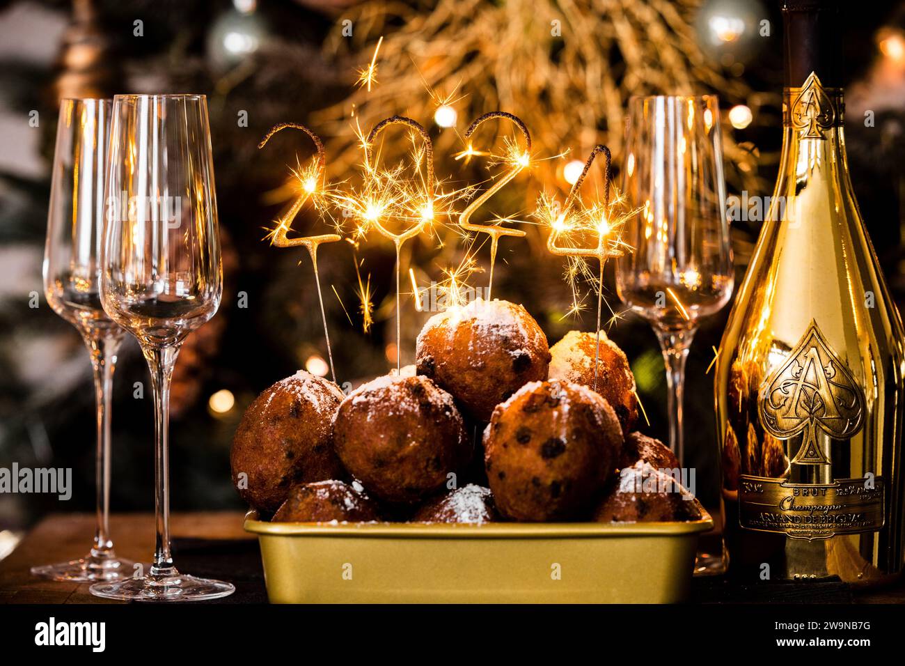 ILLUSTRATIVE - Sparklers are lit during the celebration of New Year's ...