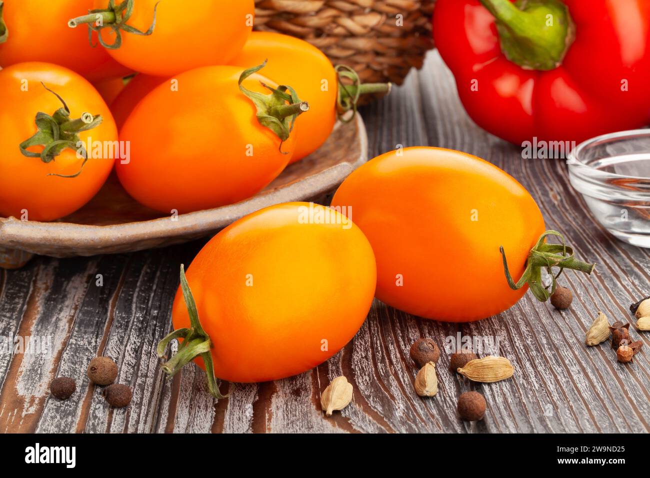 Orange plum tomato hi-res stock photography and images - Alamy