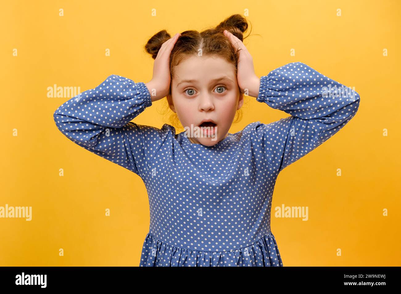 Portrait of beautiful little girl kid reacting emotionally grabbing ...