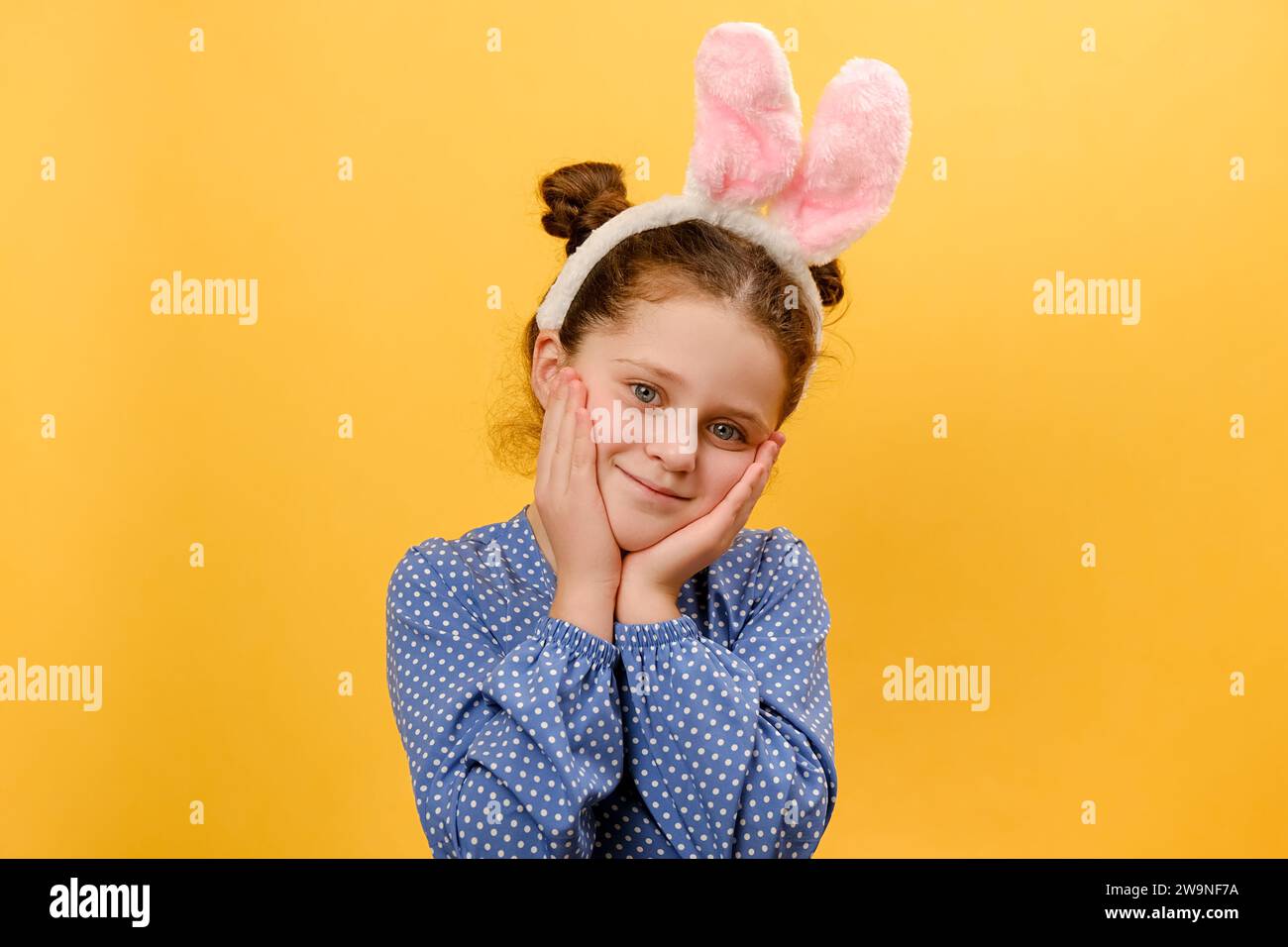 Portrait of attractive cute sweet preteen girl child wearing pink bunny ...