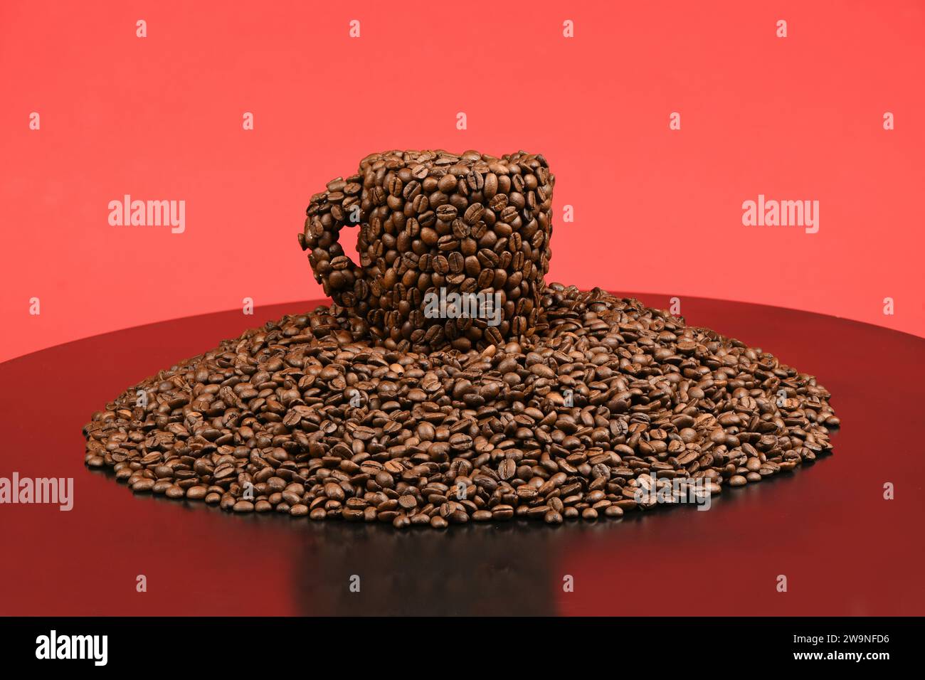 Cup of coffee made from roasted coffee beans. Coffee beans are glued ...