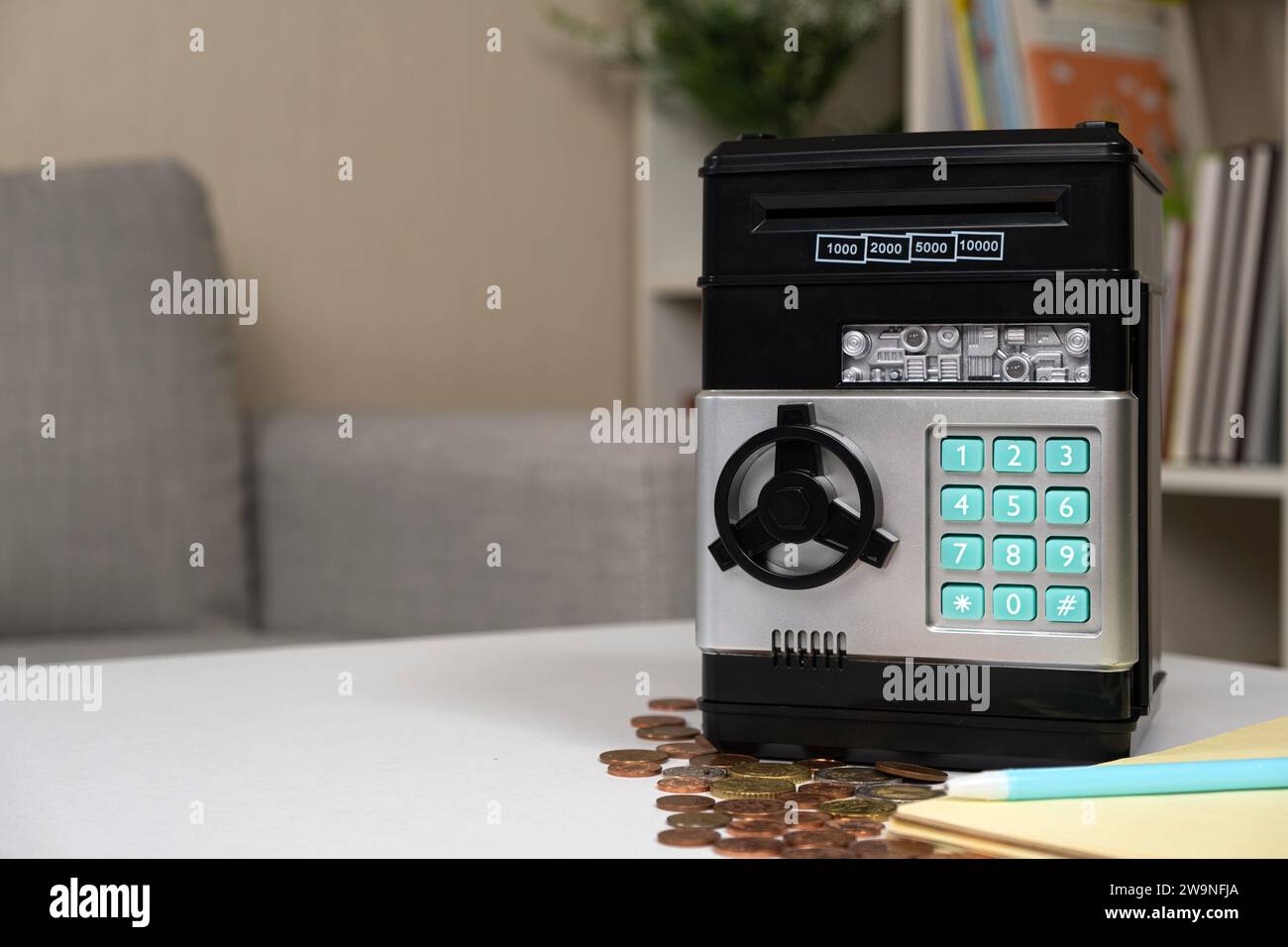 Toy safe piggy bank for money, coins and banknotes for kids Stock Photo ...