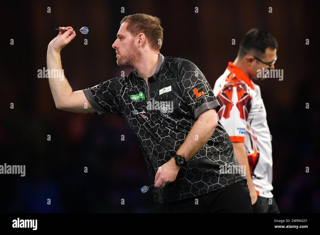 Berry van Peer in action against Damon Heta (not pictured) on day ...