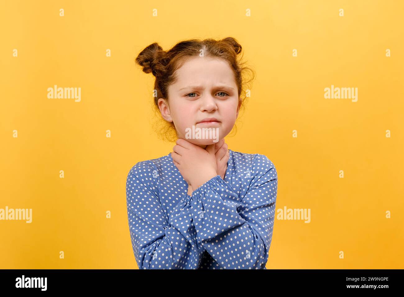 Portrait of upset ill preteen girl child writhing, holding sore throat ...