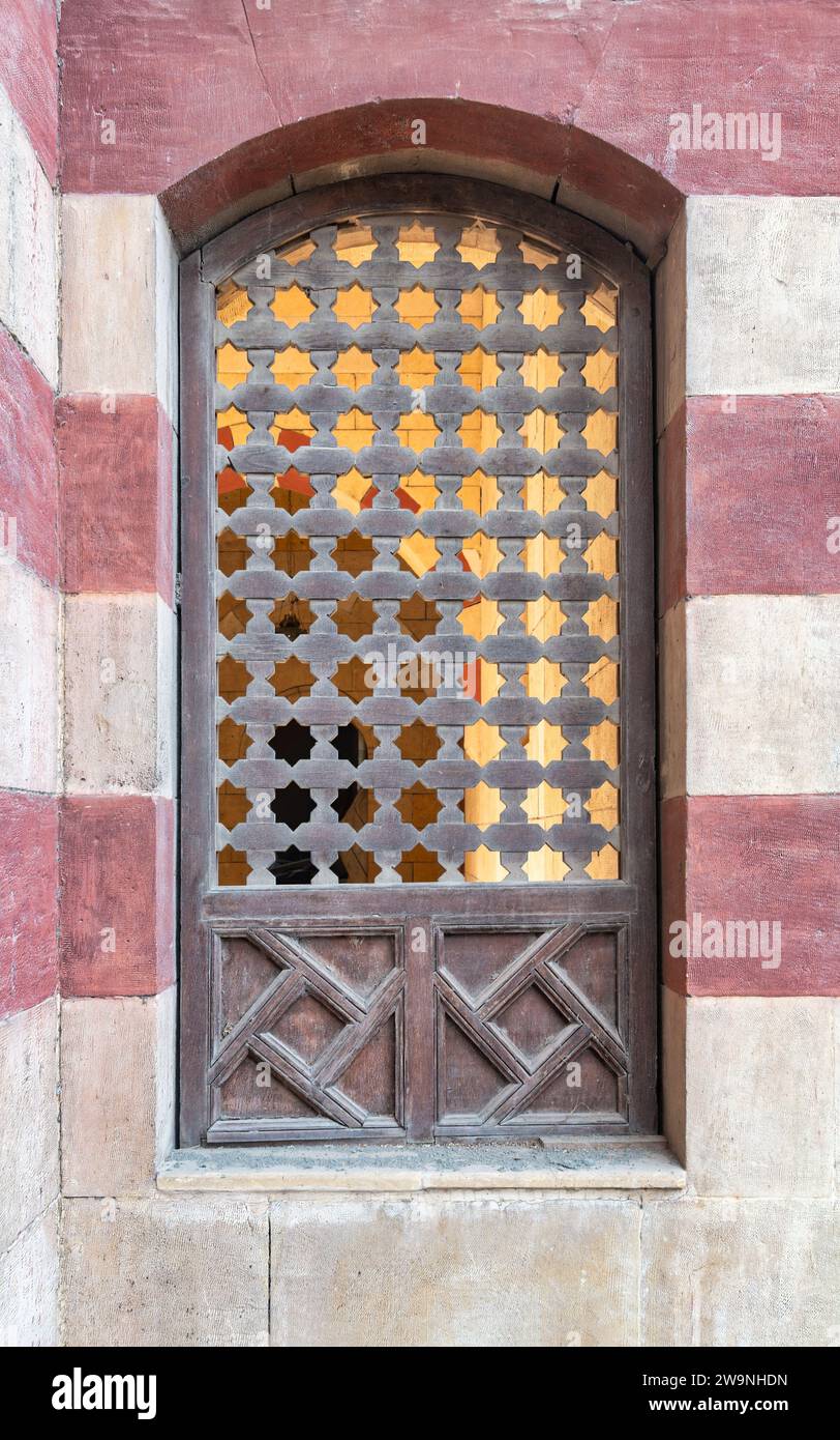 Rustic charm of Mamluk architecture weathered wooden window with a ...