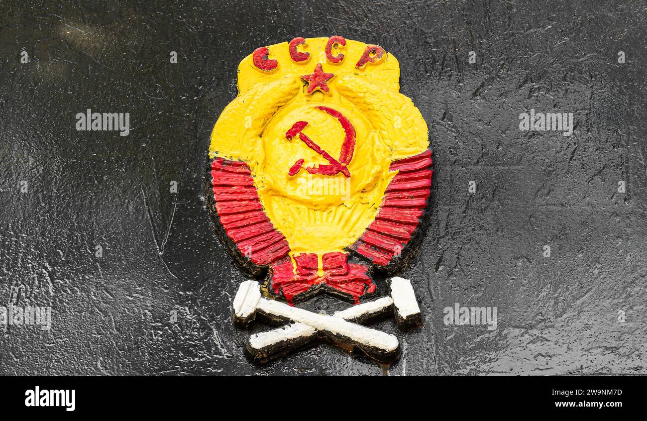 The coat of arms of the Soviet Union with a hammer, star and sickle ...