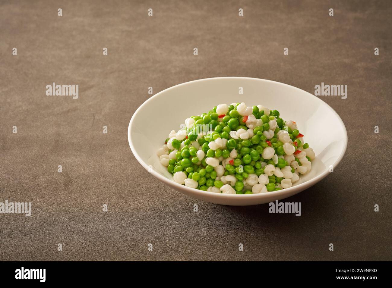 Chinese food, Stir fried green peas Stock Photo - Alamy
