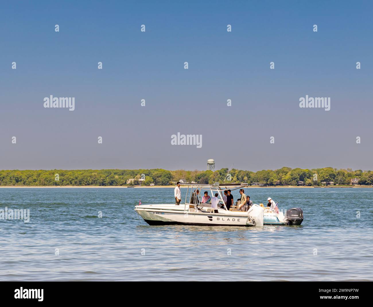 center console motor boat from Blade transporting passengers to and ...