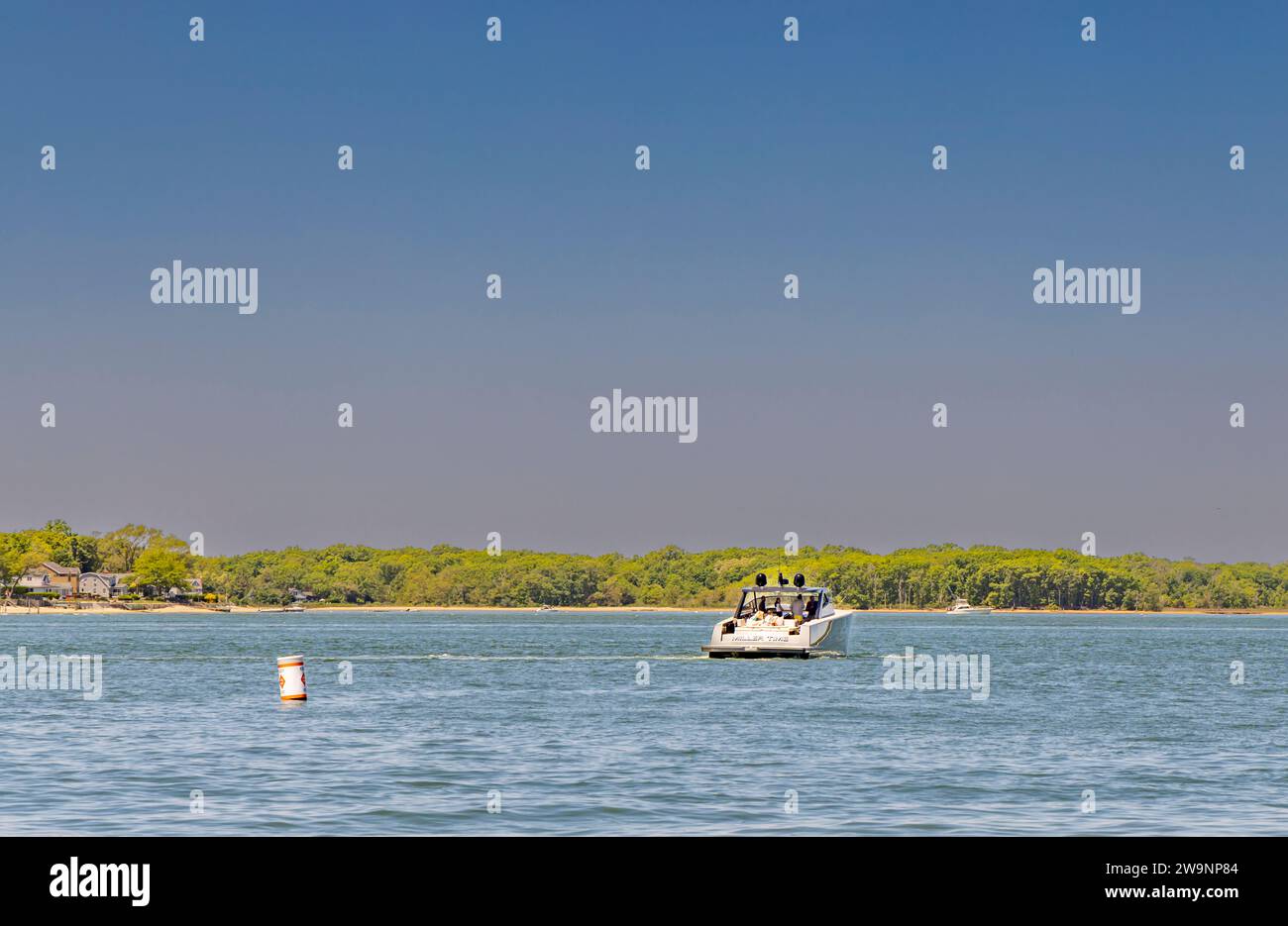 motor yacht miller time off sunset beach Stock Photo - Alamy