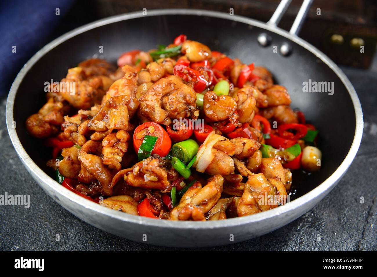 Frog with Pickled Pepper, bullfrog in sour soup Stock Photo - Alamy