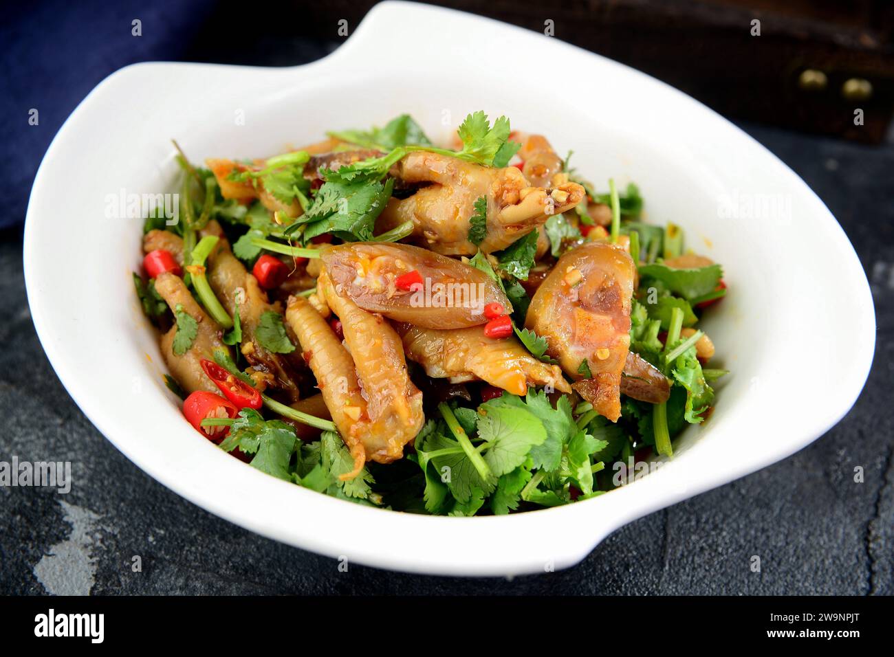 Sliced chicken feet Mixed with Coriander Stock Photo - Alamy