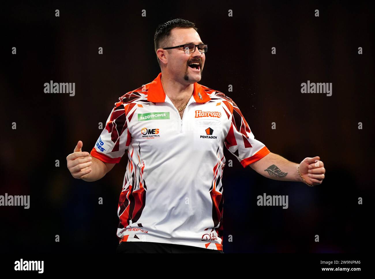 Damon Heta celebrates after beating Berry van Peer (not pictured) on ...