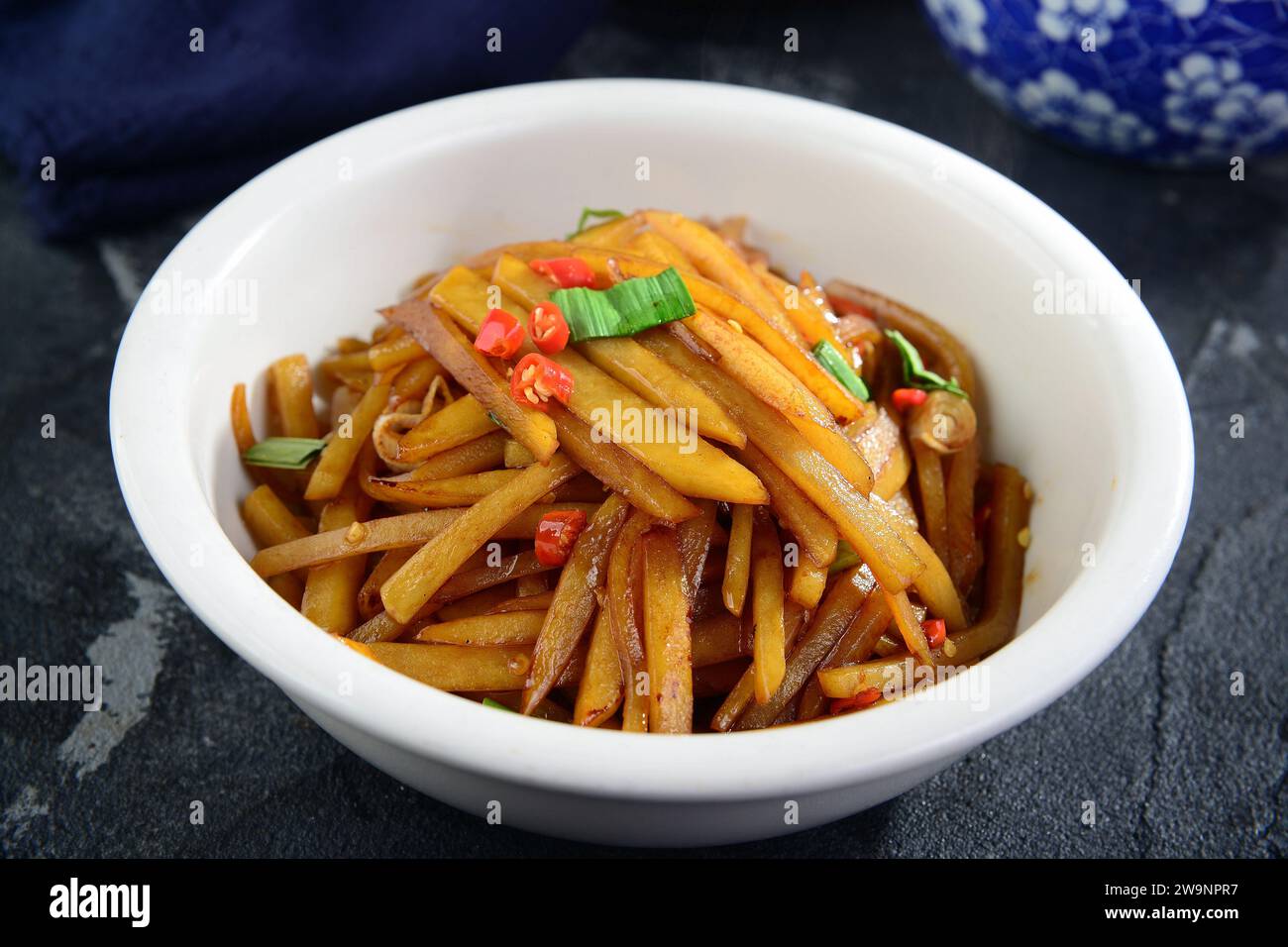 Traditional Chinese home cooking: stir-fried shredded potato. Vegetable ...
