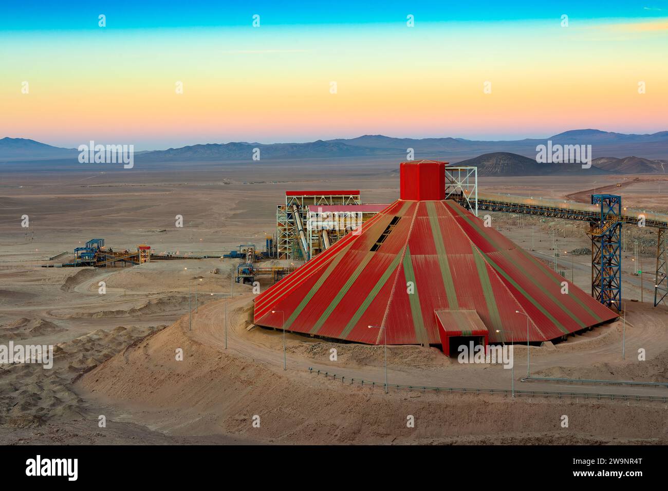 Conveyor belt and stockpile under a dome at an open-pit copper mine in ...