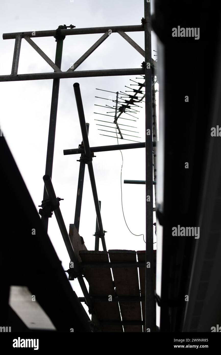 Support of scaffolding house Stock Photo - Alamy