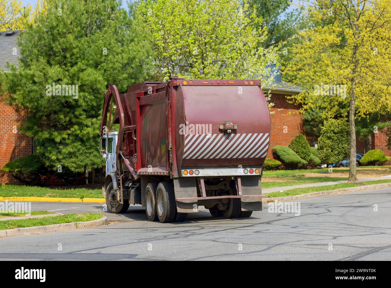 Garbage suburban disposal service truck working on streets sleeping ...