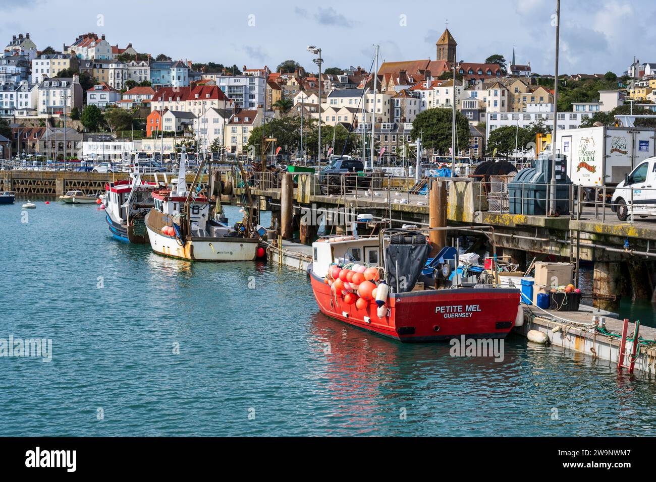 Fishing boats next to Castle Pier in St Peter Port harbour, St Peter ...