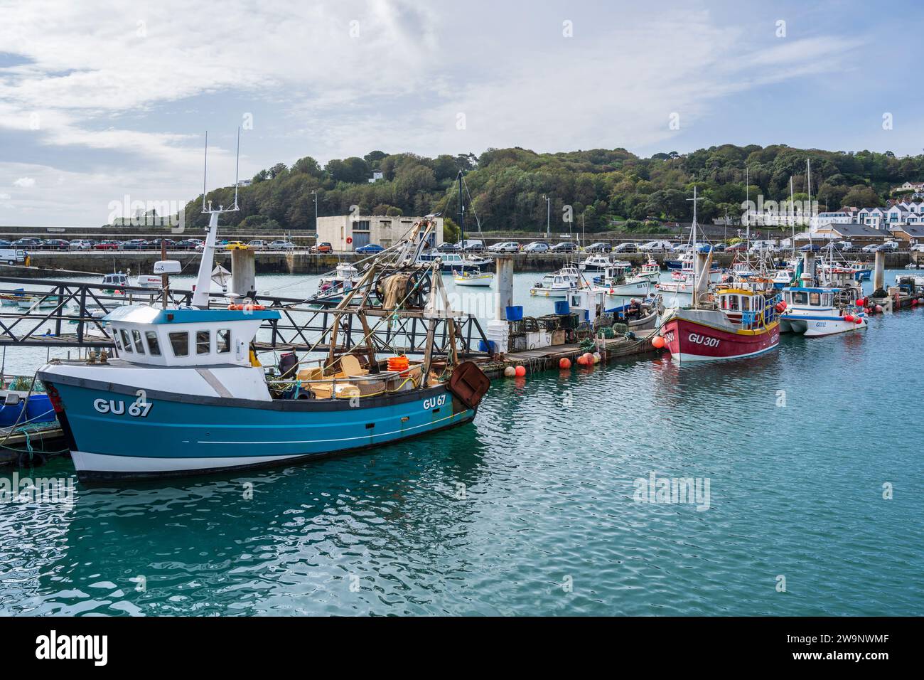 Fishing boats next to Castle Pier in St Peter Port harbour, St Peter ...