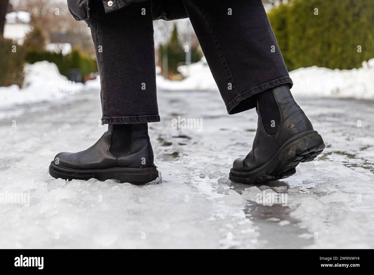 Seasonal weather, slippery roads (with snow, ice and slush) in a ...