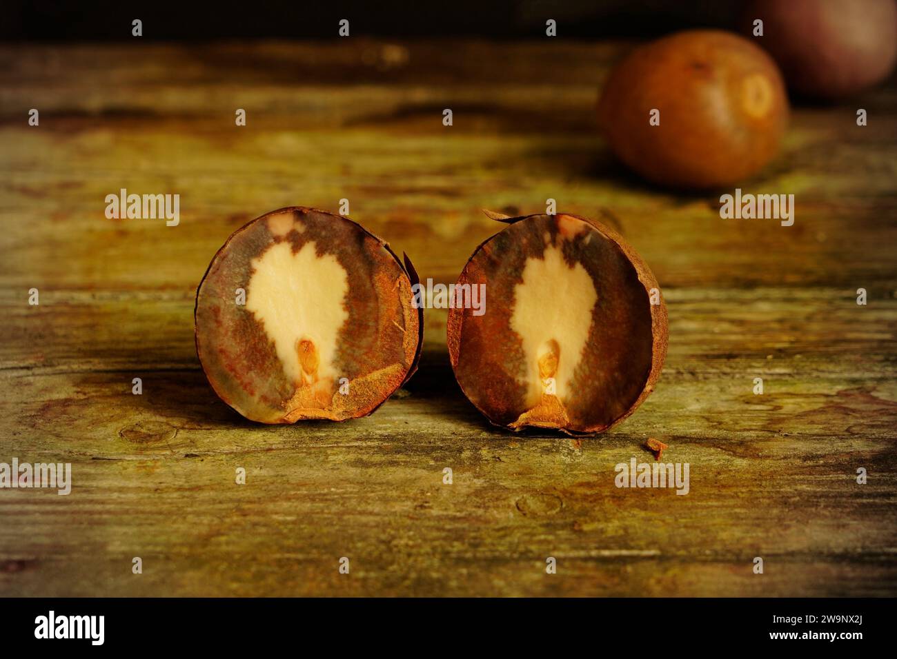 still life with avocado seeds, small roses and other gift of mother ...
