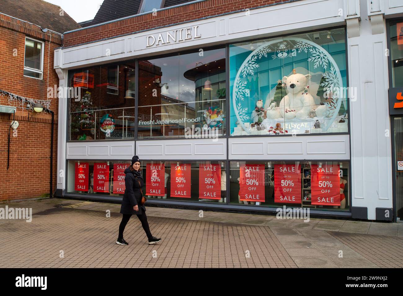 Windsor, Berkshire, UK. 29th December, 2023. Up to 50% off signs in ...