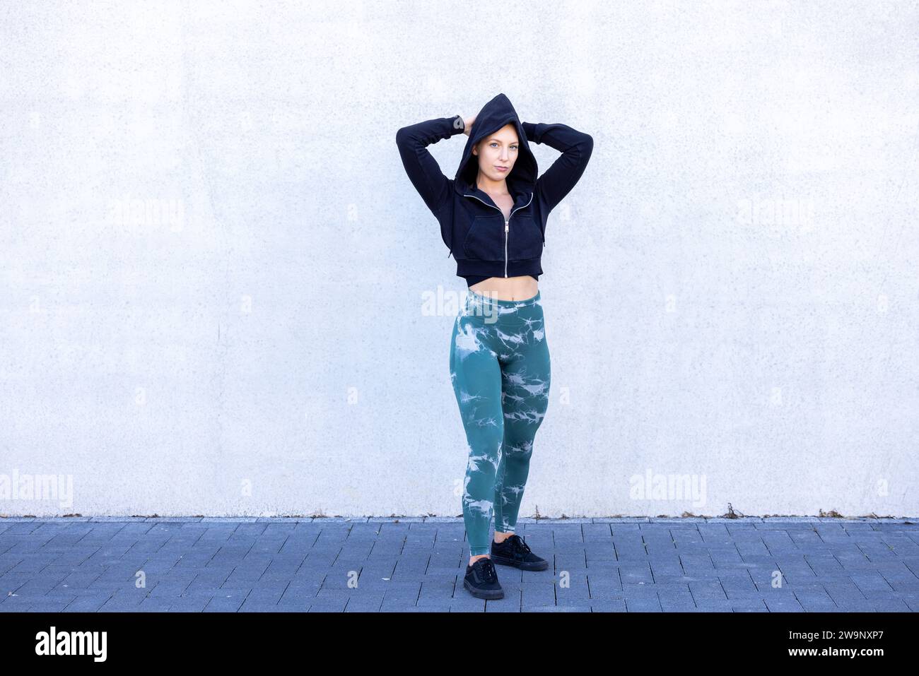 Strong woman muscles flexing flex hi-res stock photography and images ...