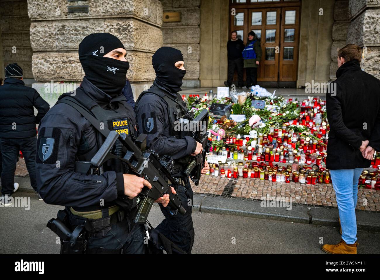 Prague, Czech Republic. 29th Dec, 2023. Armed police officers walk past ...