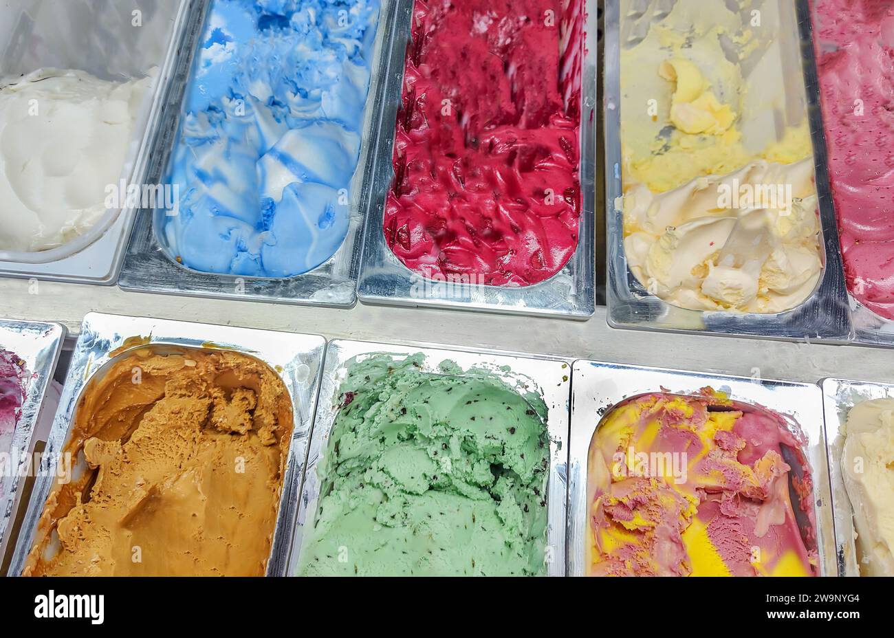 Big range of ice cream of various varieties and colors in metal ...