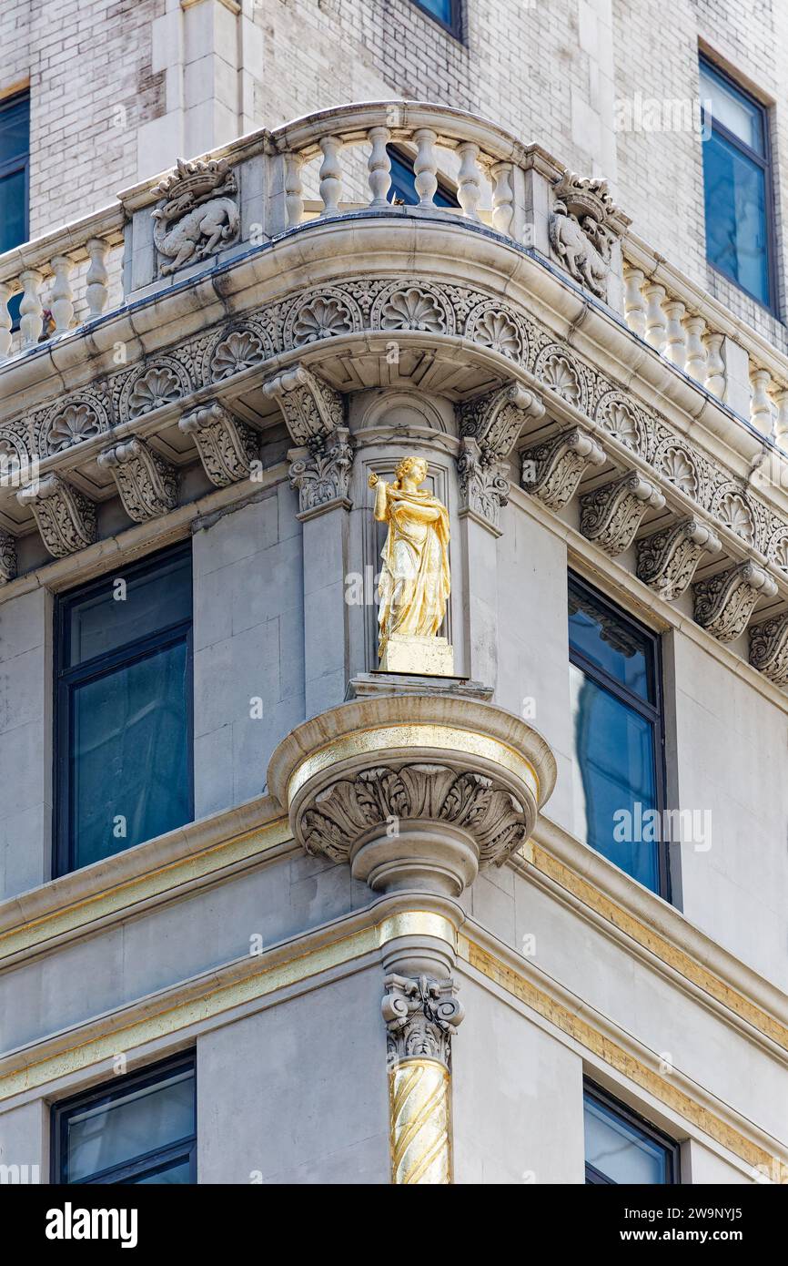 Fanciful gilt and terra cotta embellish the brick and stone façade of ...