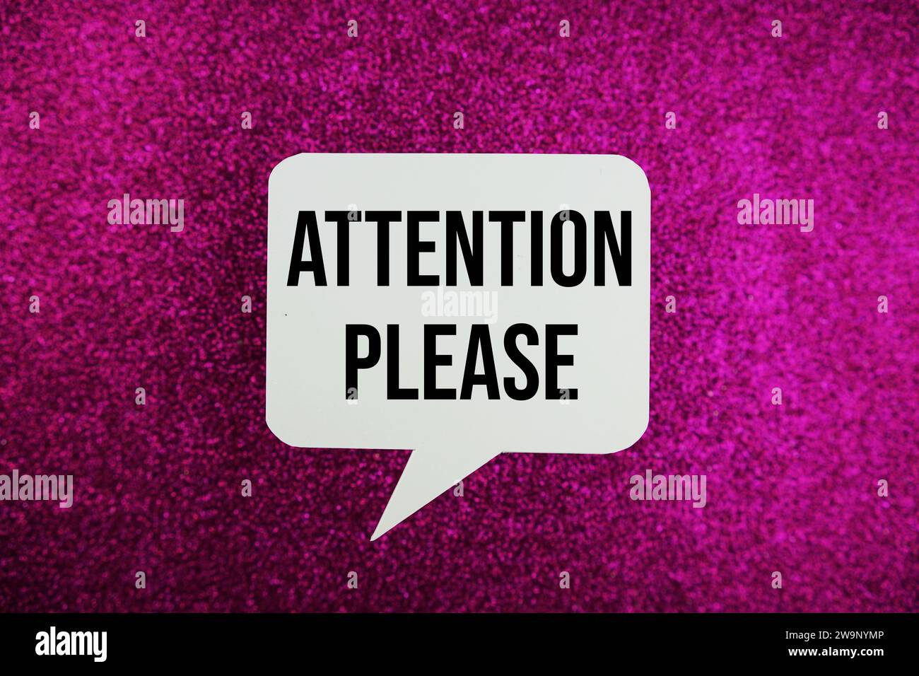 Attention Please text message in white bubble speech top view on pink ...