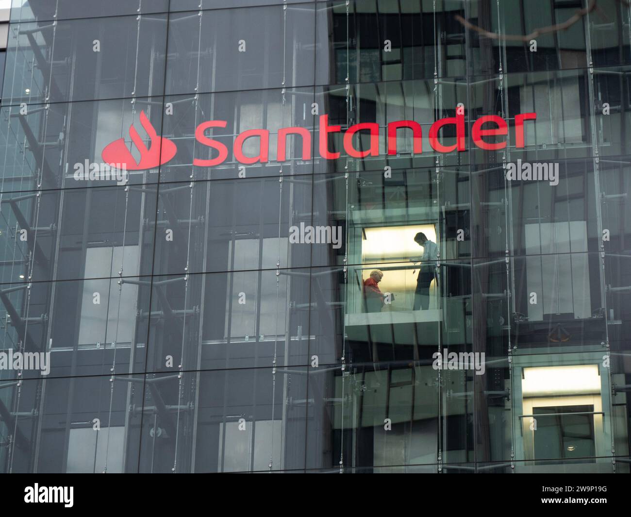 Passengers travel in lift in Santander offices in Central London ...