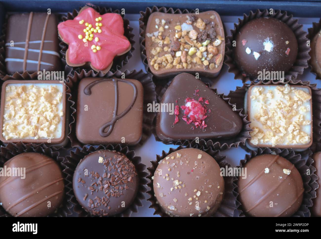 Eating chocolates box hi-res stock photography and images - Alamy