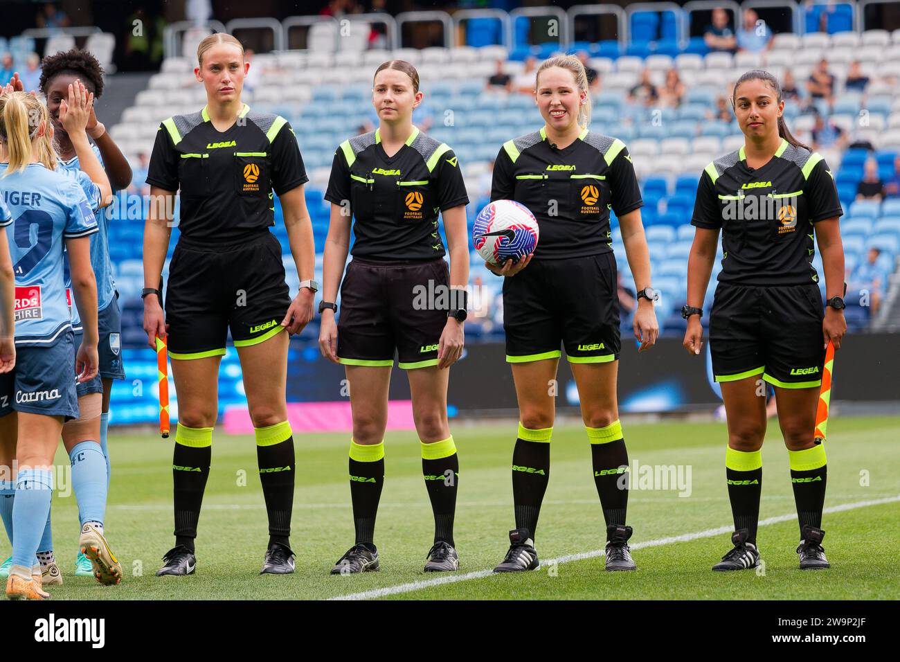 Sydney, Australia. 29th Dec, 2023. Match referees line up on the pitch ...