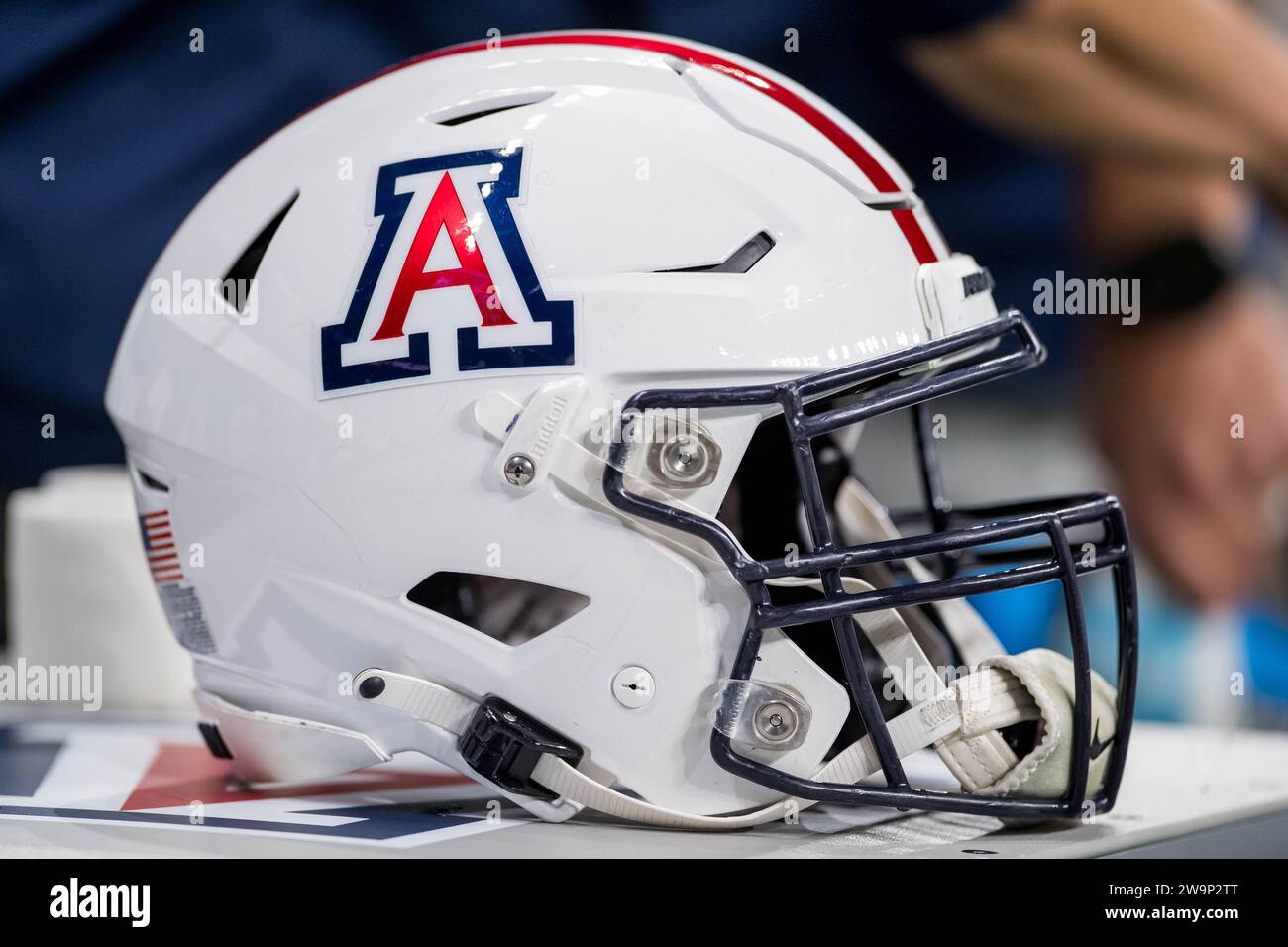 San Antonio, TX, USA. 28th Dec, 2023. An Arizona Wildcats helmet sits ...