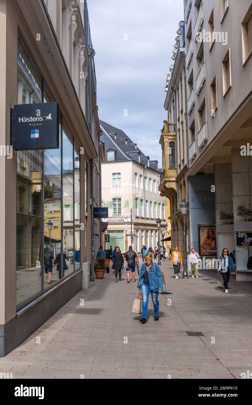 Luxembourg: August 01, 2023: People walk in the shopping street of the ...