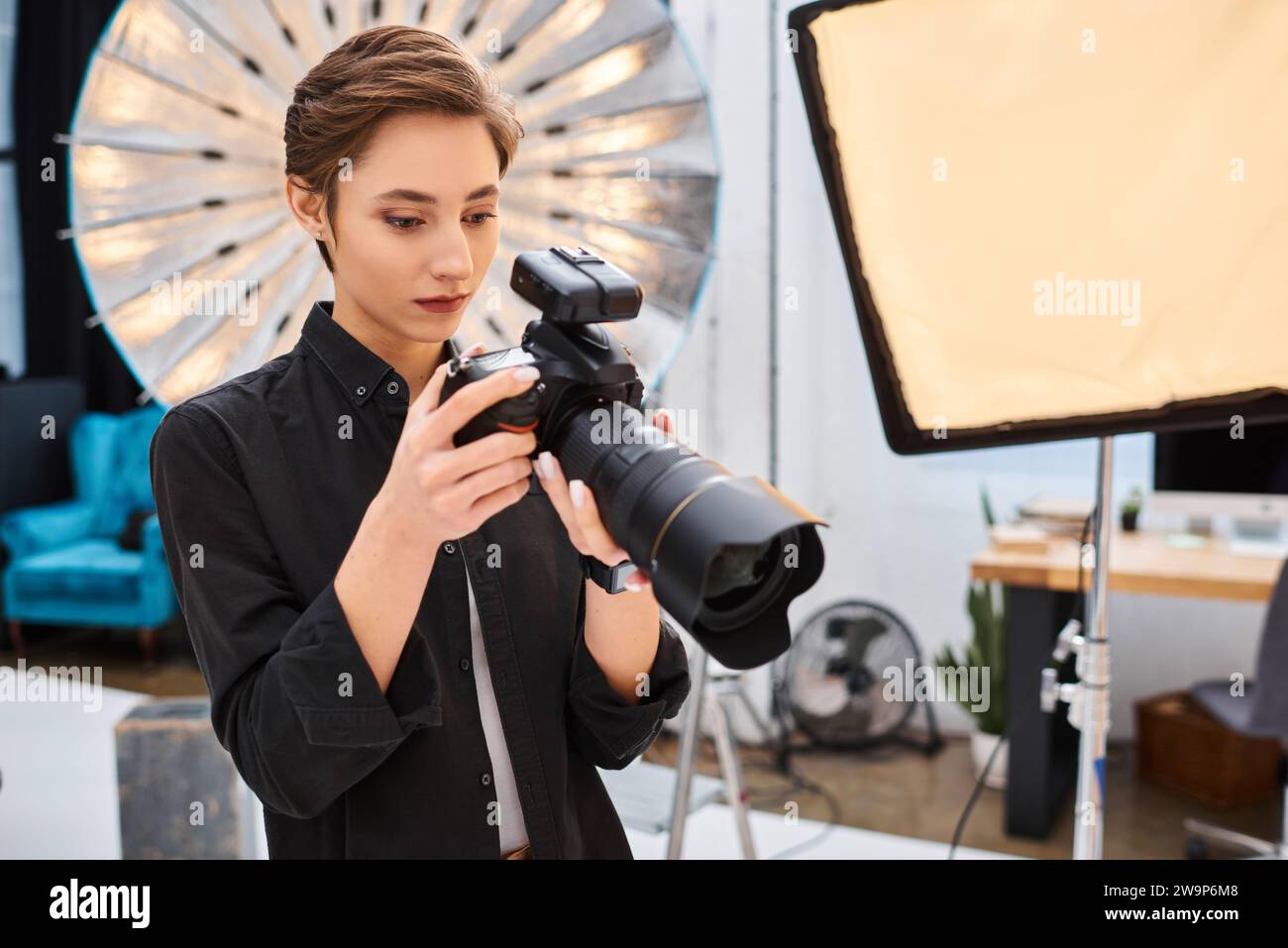 appealing concentrated woman in casual attire taking photos with her ...