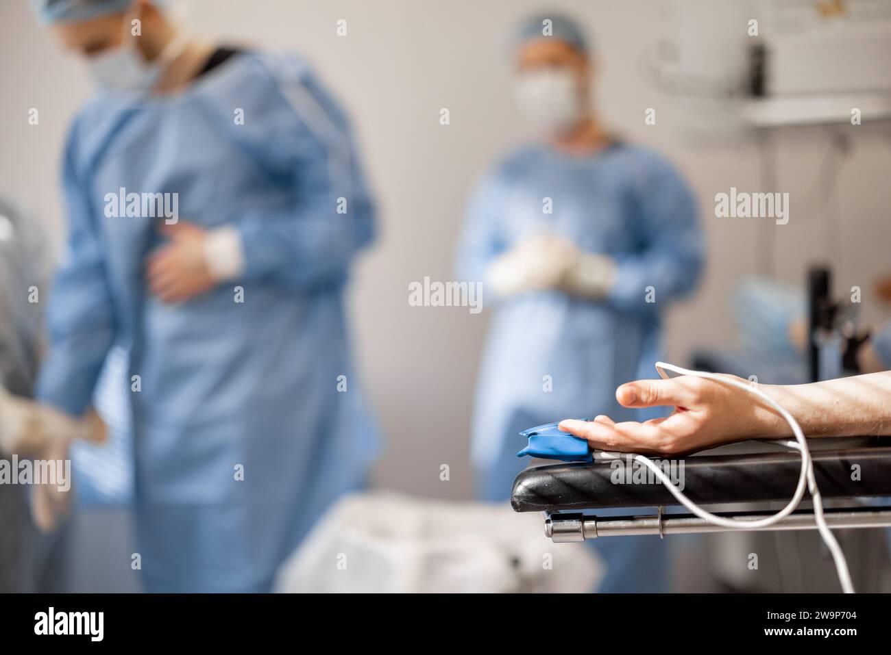 Patient's arm with a pulse oximeter in operating room Stock Photo - Alamy
