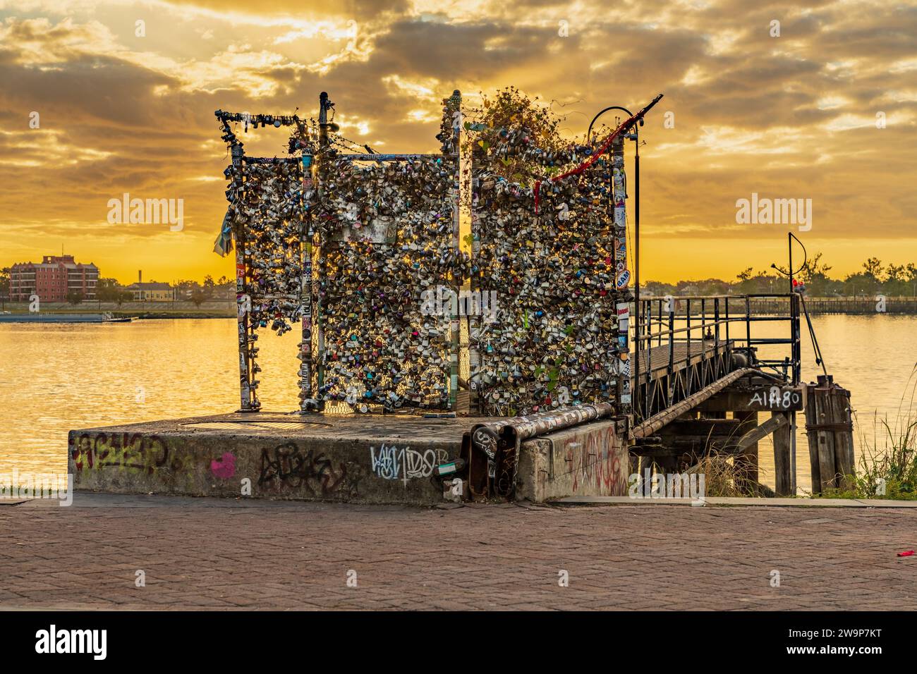 New Orleans, LA - 29 October 2023: Fence to pier covered with padlocks ...