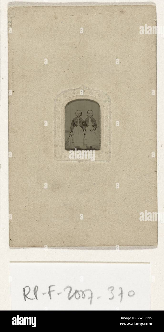 Portrait of two girls (twins?), C. 1880 - 1910 photograph marked in ...