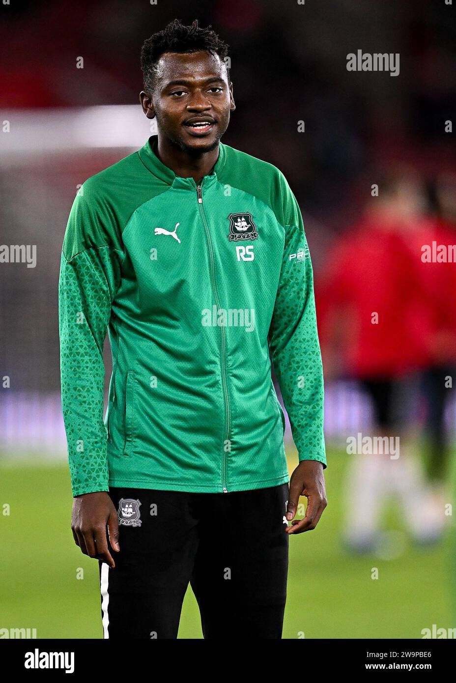 Mustapha Bundu #15 of Plymouth Argyle warming up during the Sky Bet ...