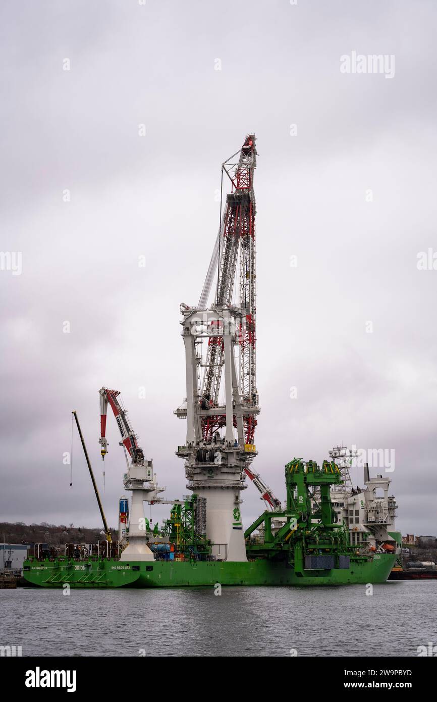 Large crane ship Orion loads windmill components at Dartmouth, Nova ...
