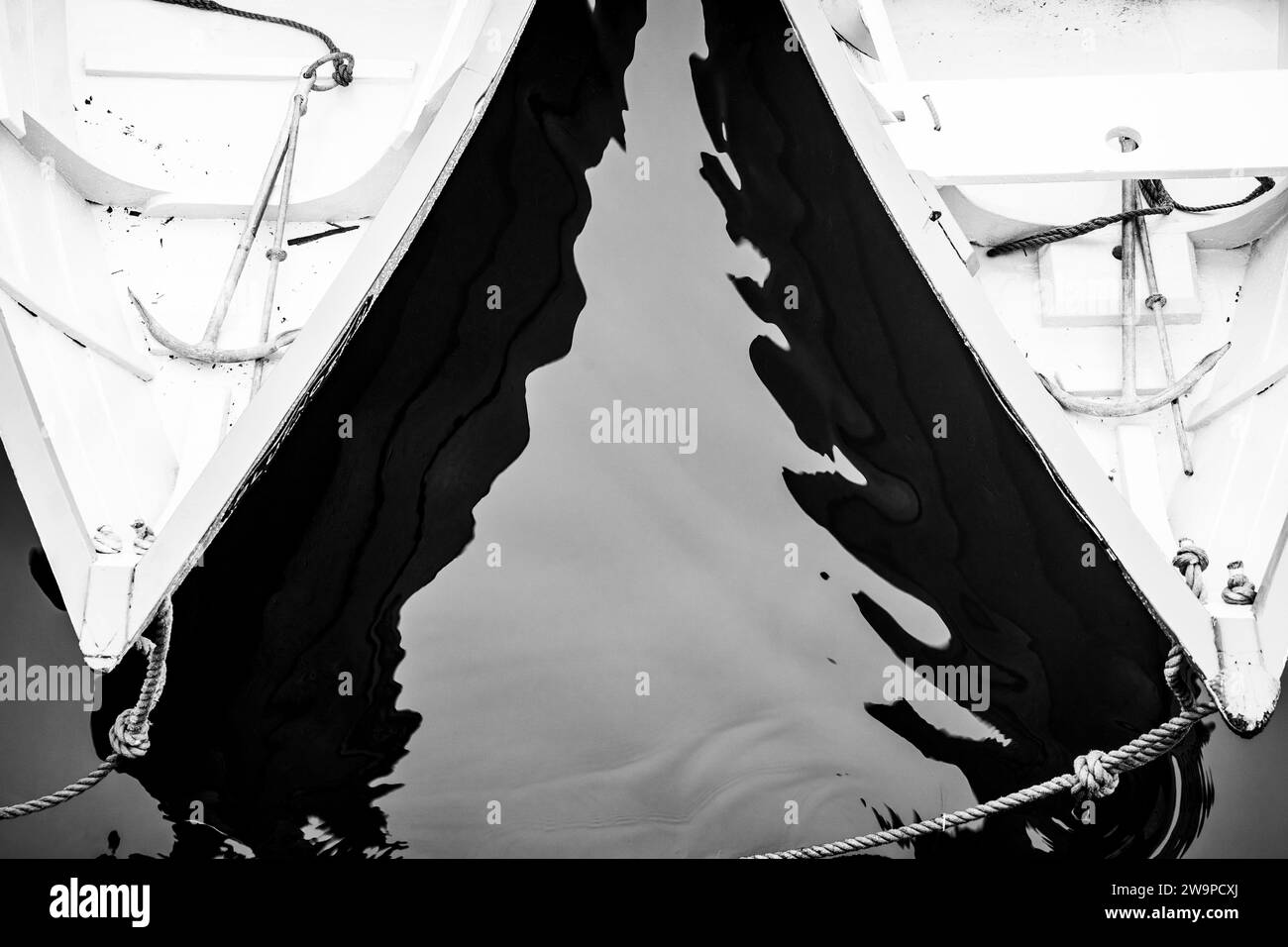 Fishing dory tied up in the harbour on a calm day at Lunenburg, Nova ...