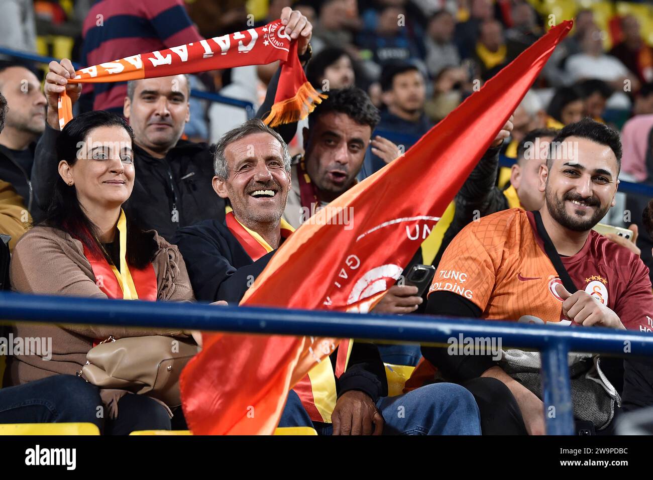Turkish soccer fans wave flags as they wait for the Super Cup match ...