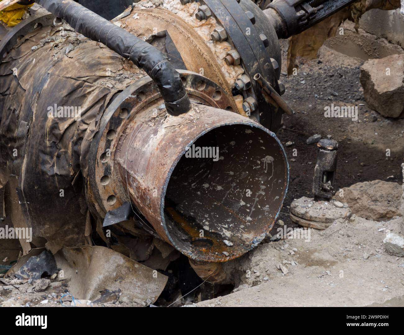 Cut pipe of the old heating main during repair work Stock Photo - Alamy