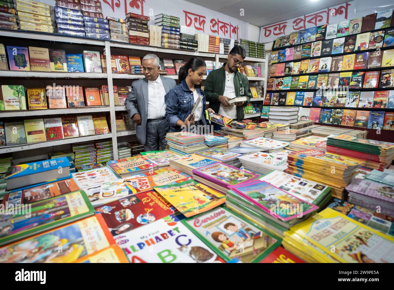 Book readers browsing books at a stall during Assam Book Fair, in ...